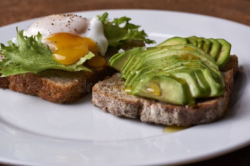 Toasta with Avocado and Egg Stock Photo - Image of poached, sliced ...