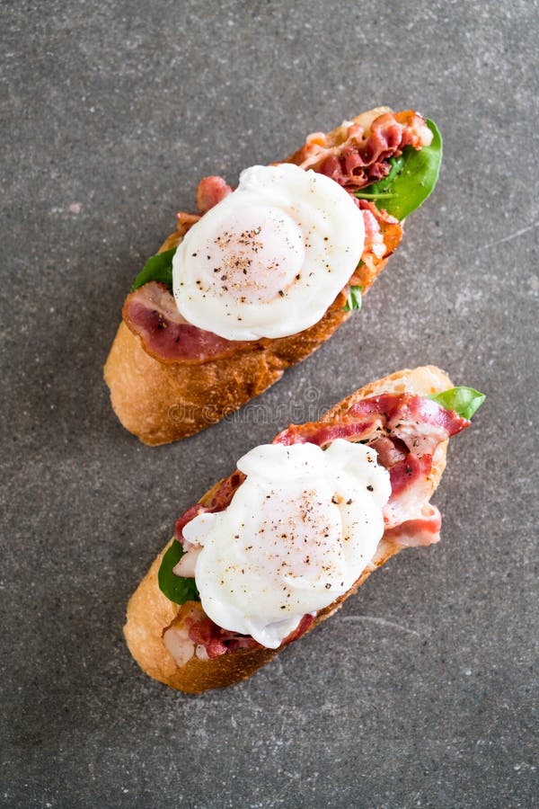 Egg Benedict with Bacon and Rocket Stock Image - Image of toast ...