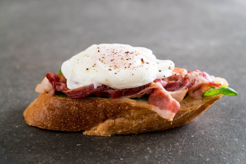 Egg Benedict with Bacon and Rocket Stock Photo - Image of benedict ...