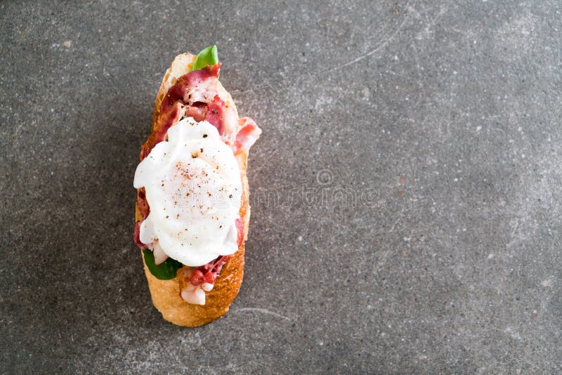 Egg Benedict with Bacon and Rocket Stock Photo - Image of isolated ...