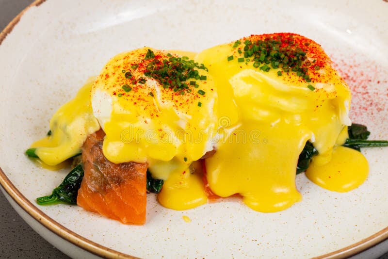 Egg Benedict with cheese stock photo. Image of bread - 130064300