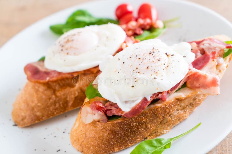 Egg benedict on plate stock image. Image of cooking - 128214843