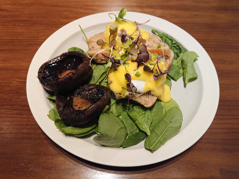 Egg Benedict Vegetarian stock image. Image of vegetable - 214987147