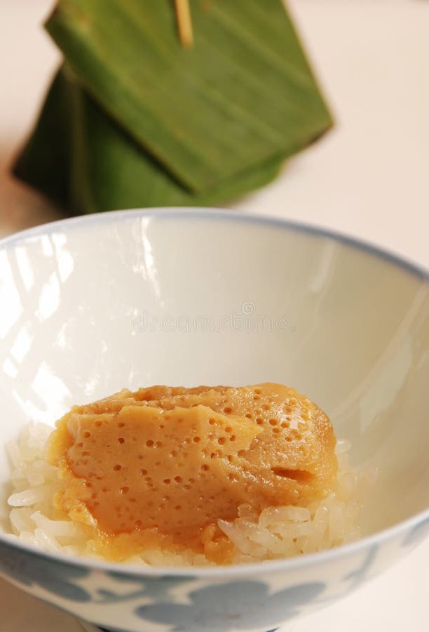 Custard Rice. Sticky Rice and Egg Custard Wrapped in Banana Leaf. Stock ...