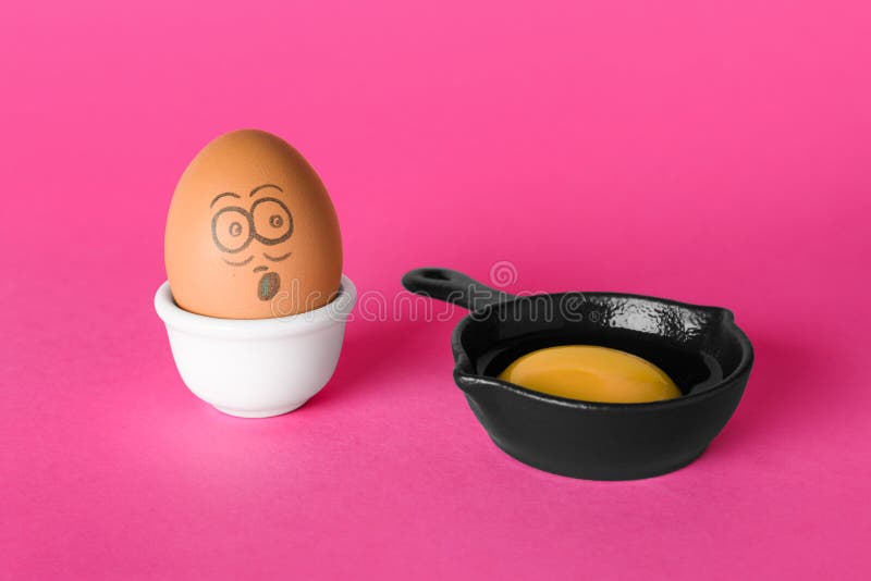 Egg with Drawn Scared Face in Shopping Cart Stunting on Black ...