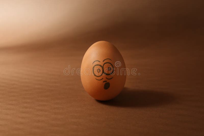 Egg with Drawn Scared Face in Shopping Cart Stunting on Black ...