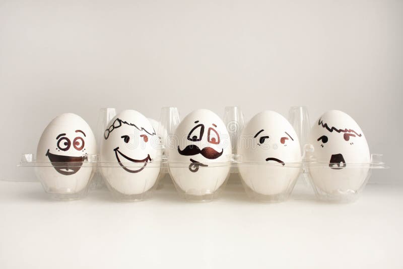 An Egg with a Face. Concept.the Wall of Eggs Stock Photo - Image of ...