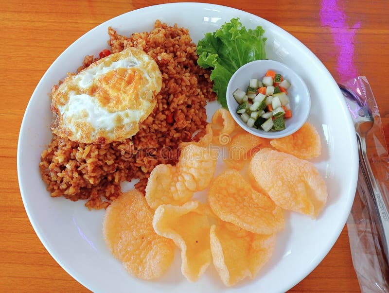 Egg Fried Rice with Crackers and Pickles Stock Image - Image of fried ...