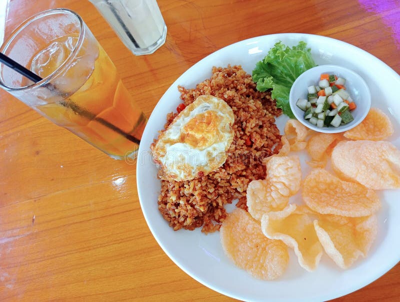 Egg Fried Rice and Iced Tea at the Dinner Table Stock Photo - Image of ...