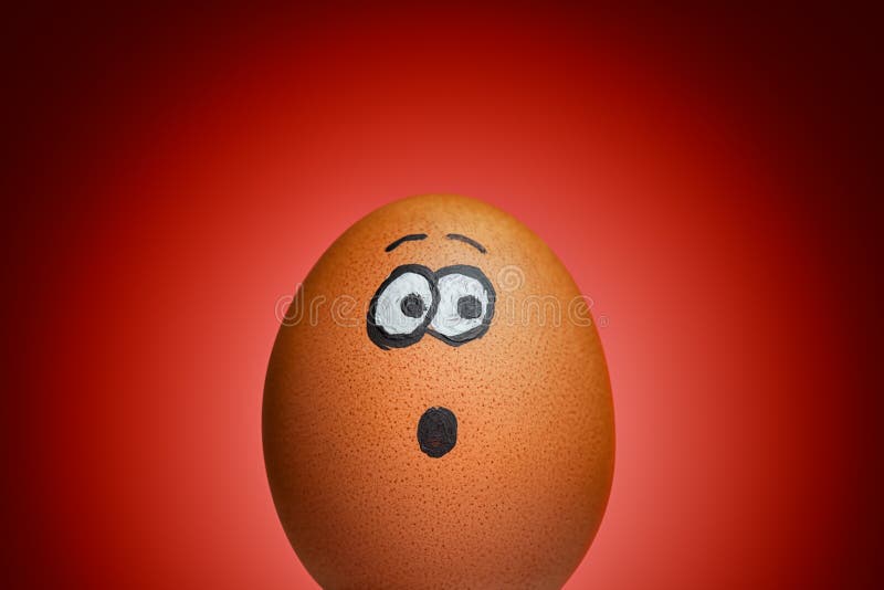 Scared or Surprised Egg on Dramatic Red Background Stock Image - Image ...