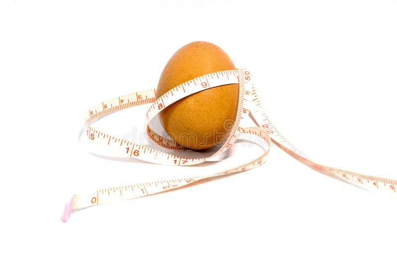 Egg with measuring tape stock photo. Image of tool, energy - 91867546