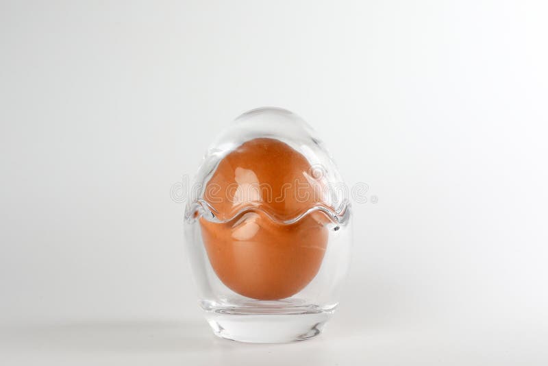 Egg in Egg Shape Glass Container Protection Shell Stock Image - Image ...