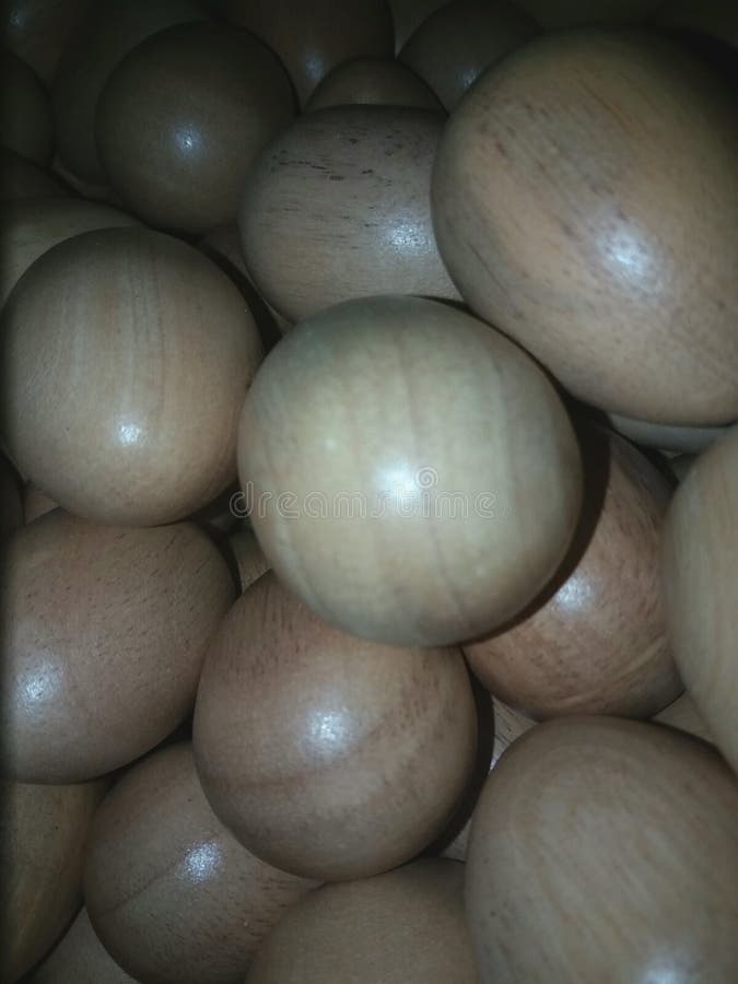 Egg-shaped wooden sphere stock image. Image of wooden - 213535531