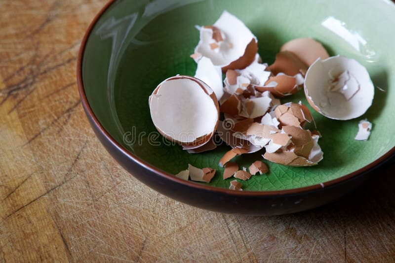 Egg Shell on Green Plate, Concept Background Stock Image - Image of ...
