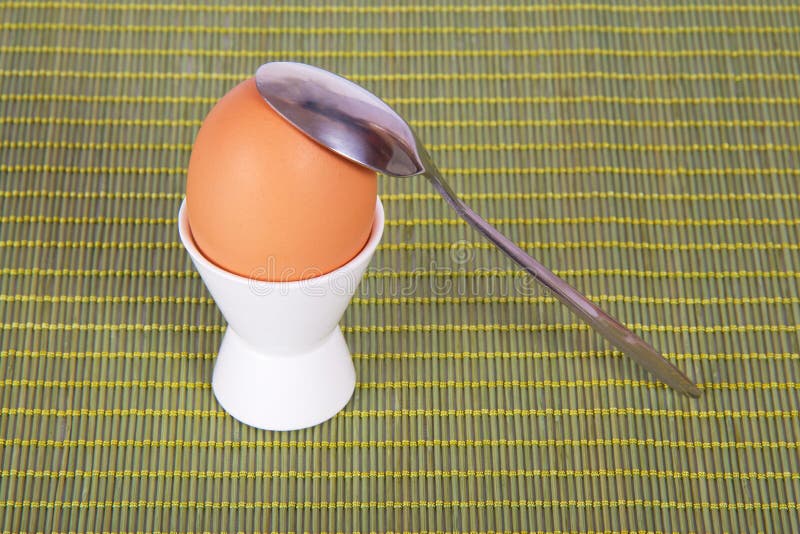 Egg in a support stock image. Image of brown, nourishment - 35378403