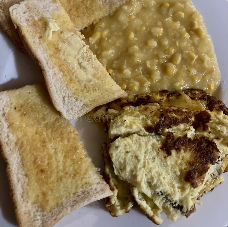 Egg, Sweet Corn and Toast on a White Plate Stock Image - Image of stuff ...