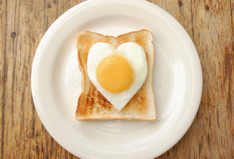 Egg and toasted bread stock image. Image of lunch, heartshaped - 14317963