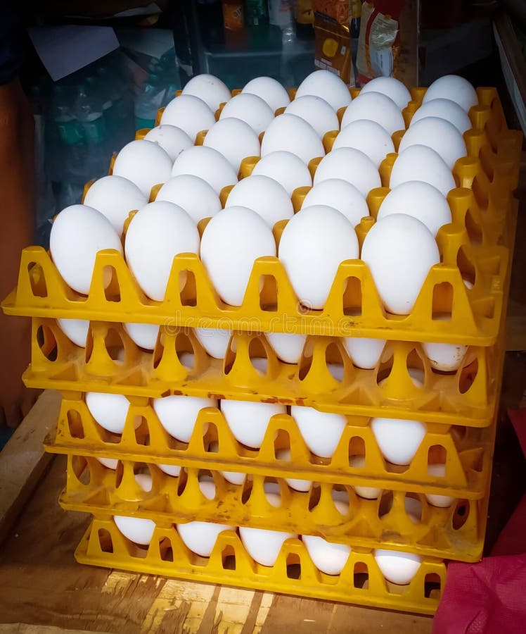 Egg Trey in Table photo. stock image. Image of yellow - 186874281