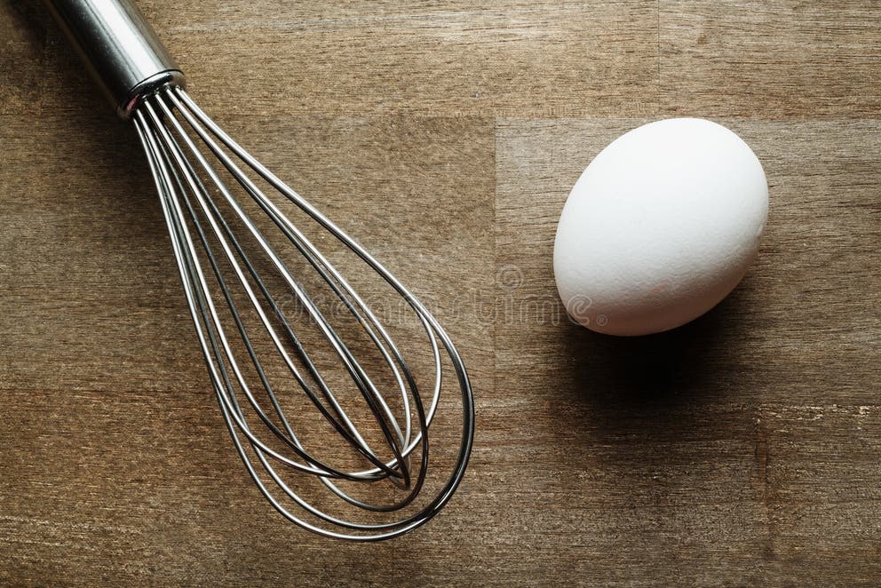 Egg and Whisk stock photo. Image of ingredient, metal - 340388596