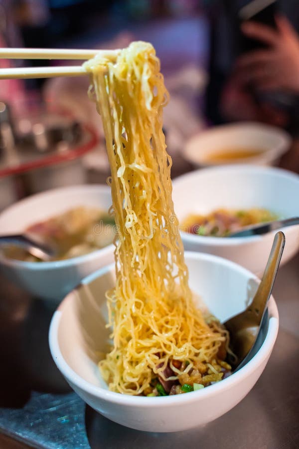 Egg yellow noodle in bowl stock image. Image of yellow - 156402451