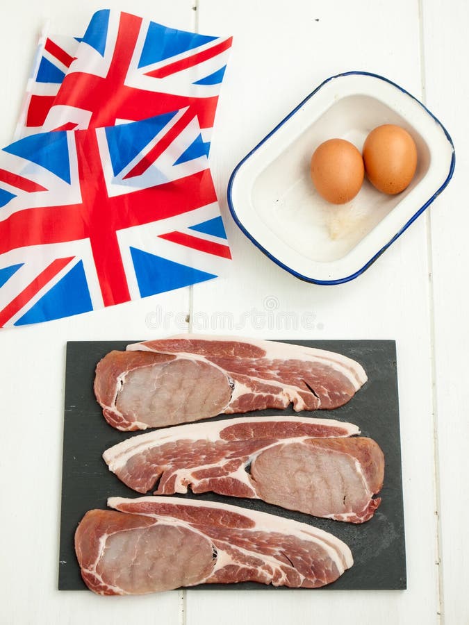 Bacon and Eggs with Cup of Tea, Toast and British Flag Behind Stock ...