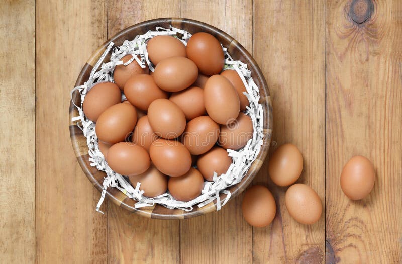Eggs in a Basket on the Table Stock Photo - Image of basket, organic ...