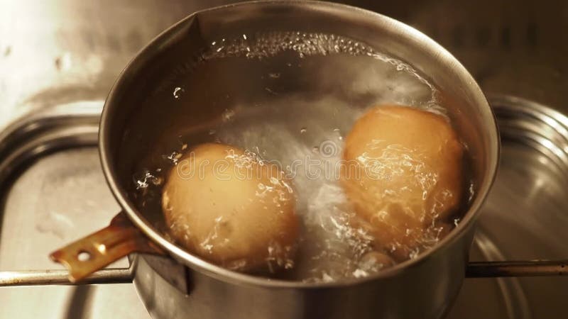 Eggs in Boiling Water. Filmed on a High-speed Camera at 1000 Fps Stock ...