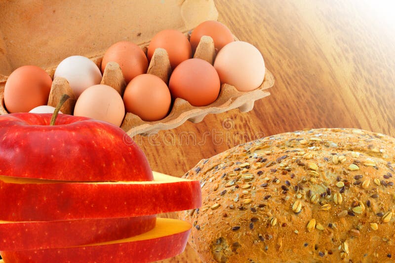 Eggs, Bread and Apple on the Table Stock Photo - Image of apple ...