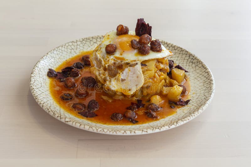 Eggs with chistorra stock photo. Image of appetizer - 200769068