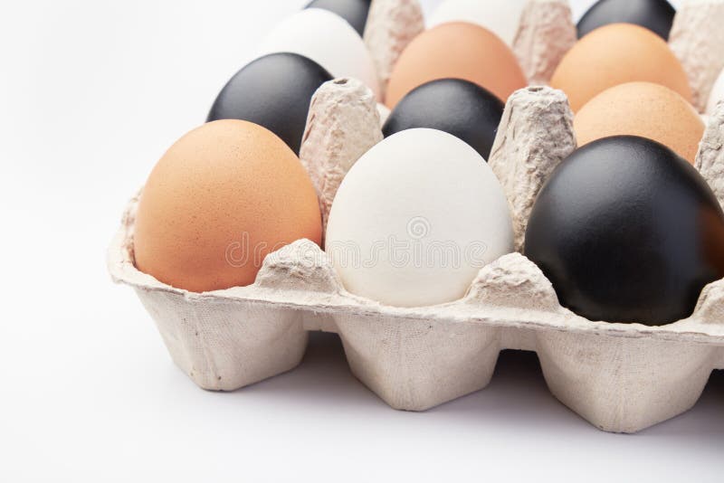 Eggs of Different Colors in Boxes. Black, White and Brown Chicken Eggs ...