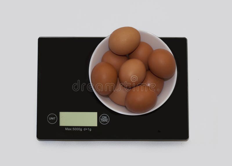 Eggs on a Digital White Kitchen Scale. Stock Photo - Image of aromatic ...