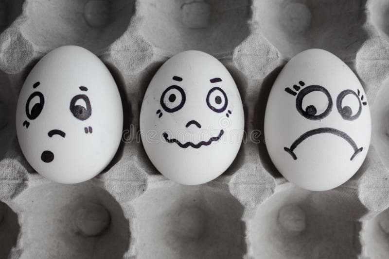 Eggs with Faces Photo for Your Design. in the Box Stock Image - Image ...