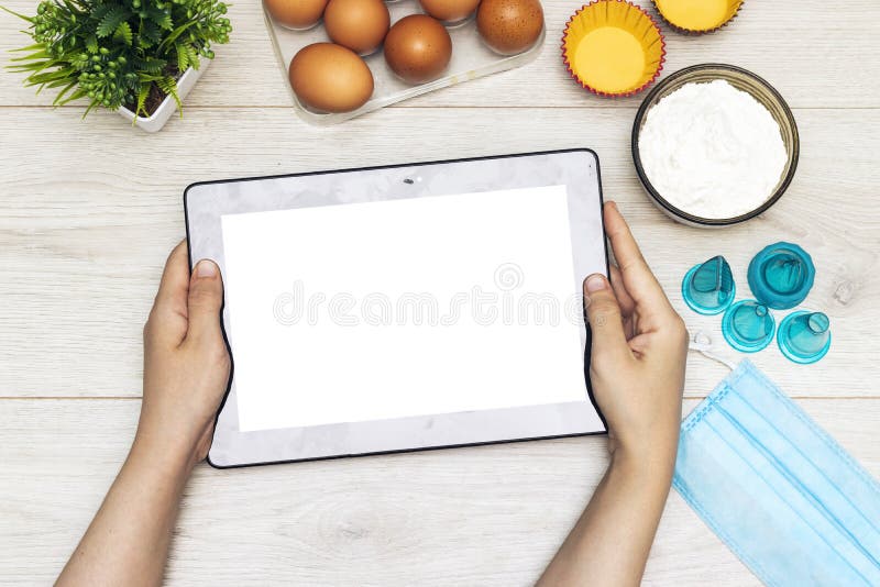 Eggs and Flour and Hands Holding Tablet Stock Photo - Image of device ...