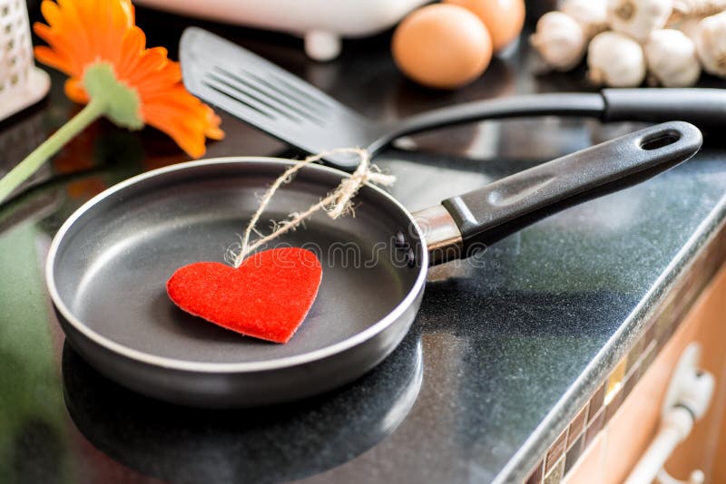 Eggs in a Frying Pan for Love Stock Photo - Image of circle, bright ...