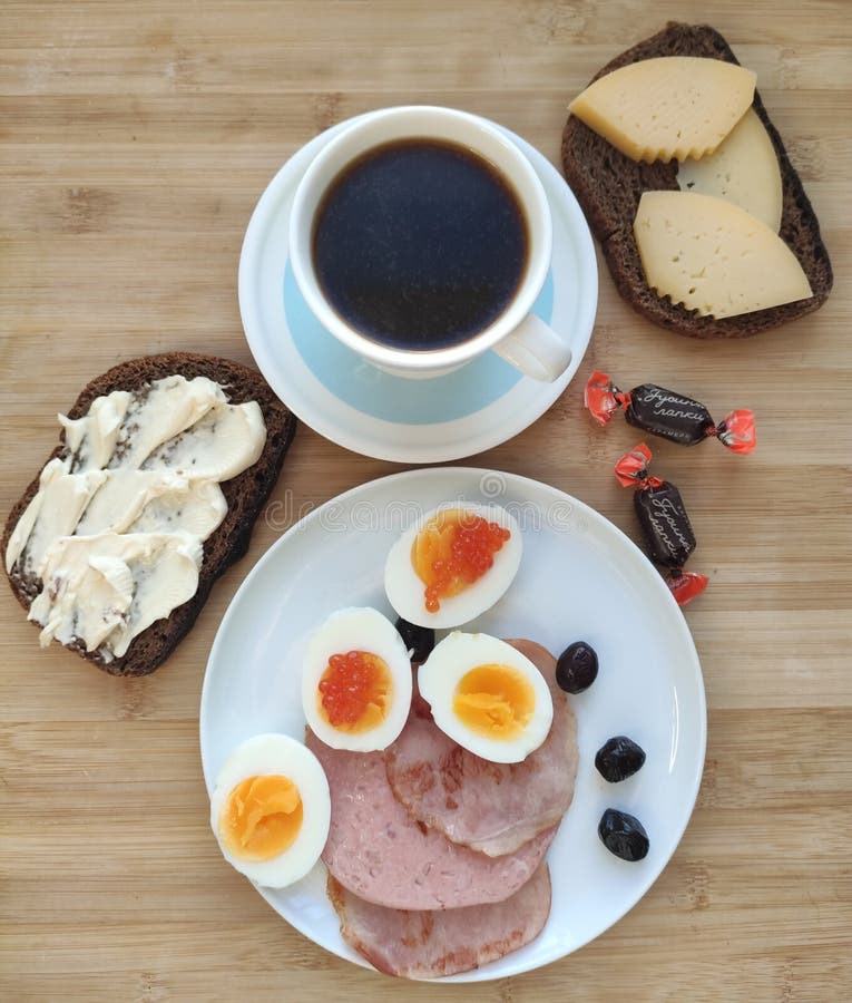 Eggs Ham Cheese Bread and Coffee for Breakfast on the Wood. Stock Photo ...