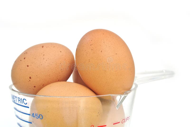 Eggs in measuring cup stock photo. Image of cooking, group - 53772680