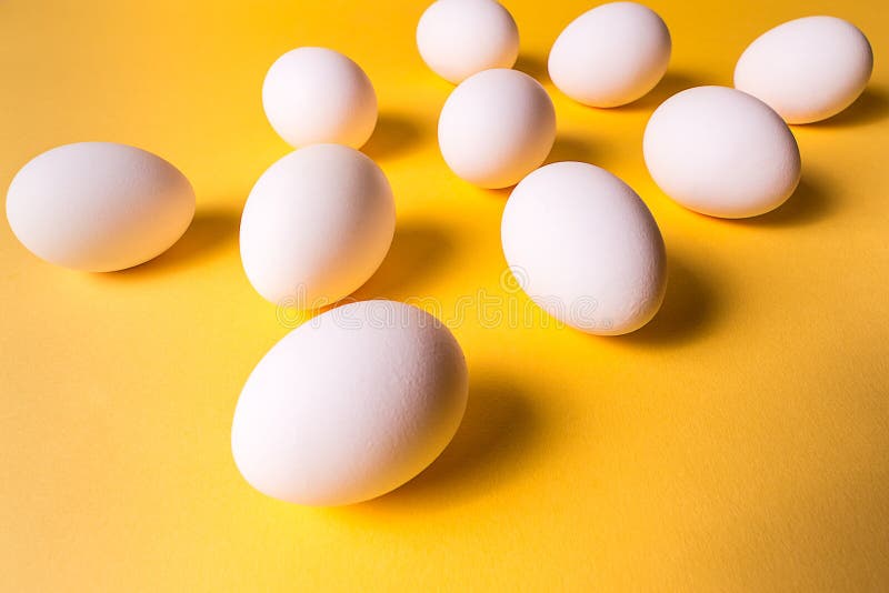 Eggs Pattern Over Yellow Pastel Background. Front View Stock Image ...