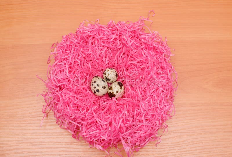 Eggs in a Pink Nest on the Table Stock Photo - Image of april, diet ...