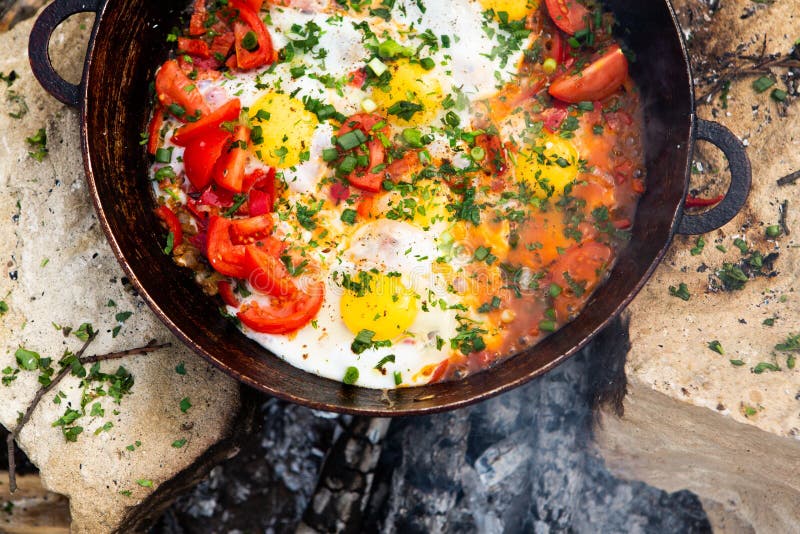 Eggs Prepared with Vegetables on a Frying Pan on the Fire in the Forest ...
