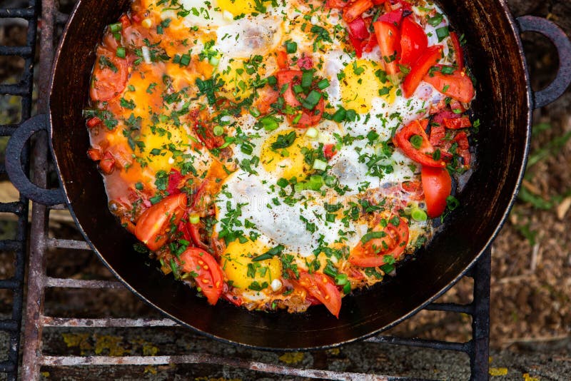 Eggs Prepared with Vegetables on a Frying Pan on the Fire in the Forest ...