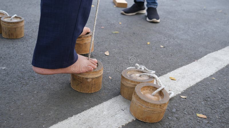 Permainan Tradisional Egrang Stock Photos - Free & Royalty-Free Stock ...