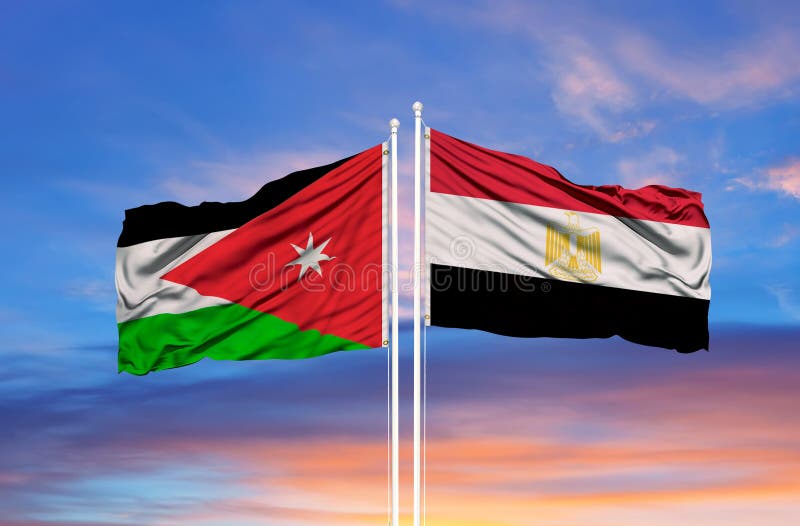Egypt and Jordan Two Flags on Flagpoles and Blue Cloudy Sky Stock ...