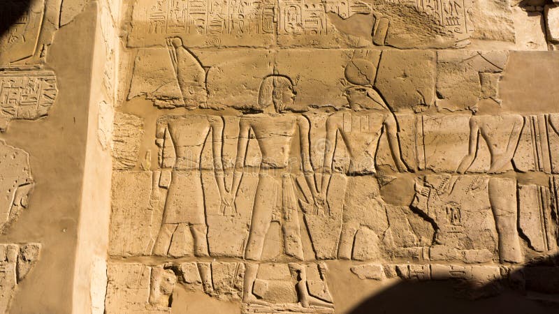 Egyptian Ancient Temple Engravings on Stock Image - Image of travel ...