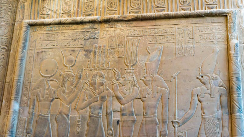 Egyptian Ancient Temple Engravings on Stock Photo - Image of ...