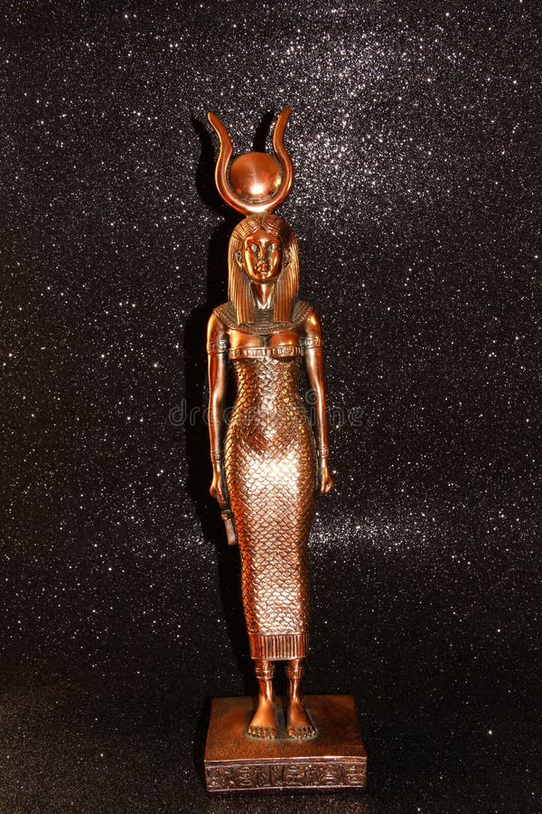 The Egyptian Goddess ISIS on a Black Background. a Bronze Egyptian ...