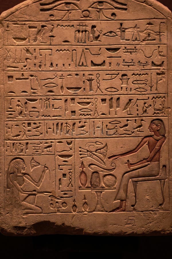 Egyptian Hieroglyphs on a Sandstone Slab in the Rays of the Evening Sun ...