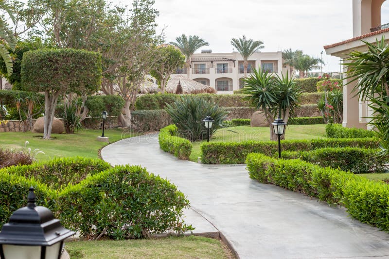 Egyptian hotel garden path stock photo. Image of garden - 84009206