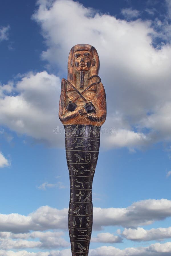 Egyptian Pharaoh Statue with Hieroglyphics and Blue Sky Stock Image ...
