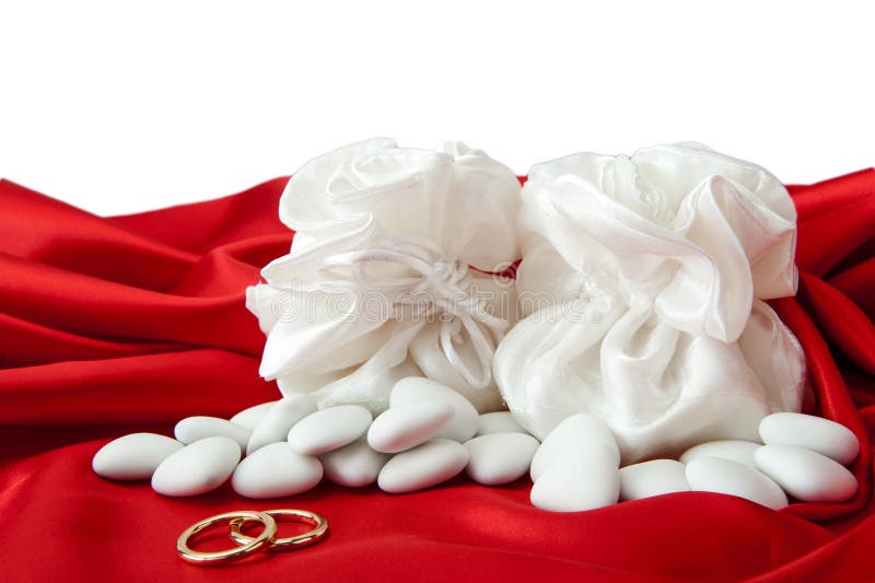 Eheringe Und Bevorzugungen Auf Elegantem Gewebe Stockbild - Bild von ...