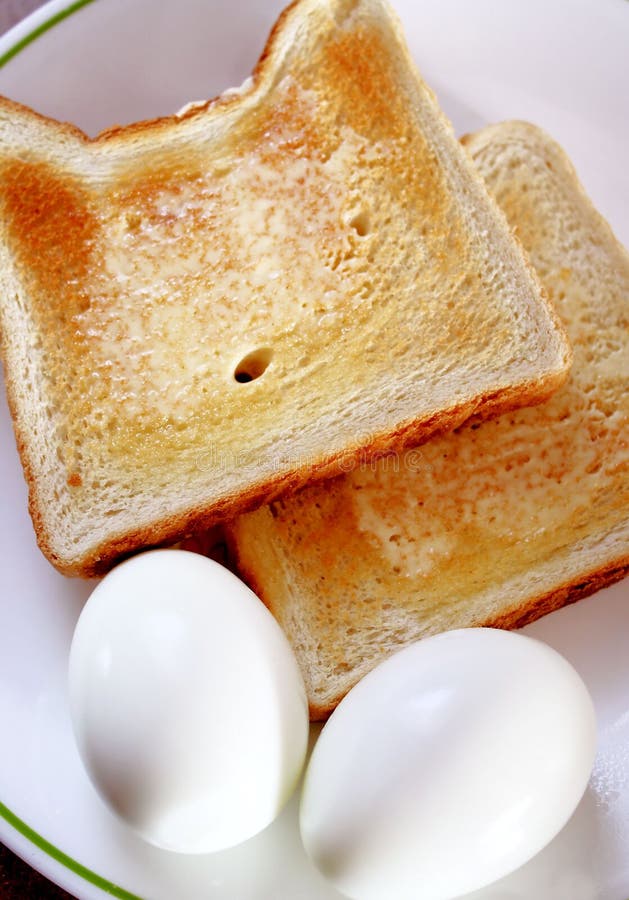 Eier und Toast stockbild. Bild von butterartig, geröstet - 18451899